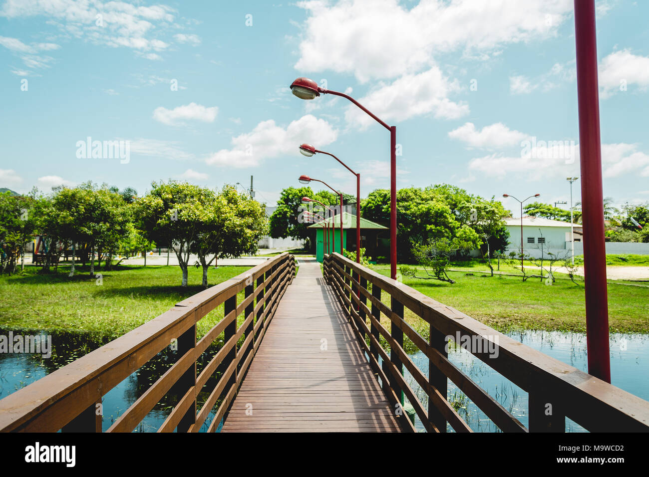 Florianopolis, Brazil. Februry, 2018. Wooden bridge over small lake ...