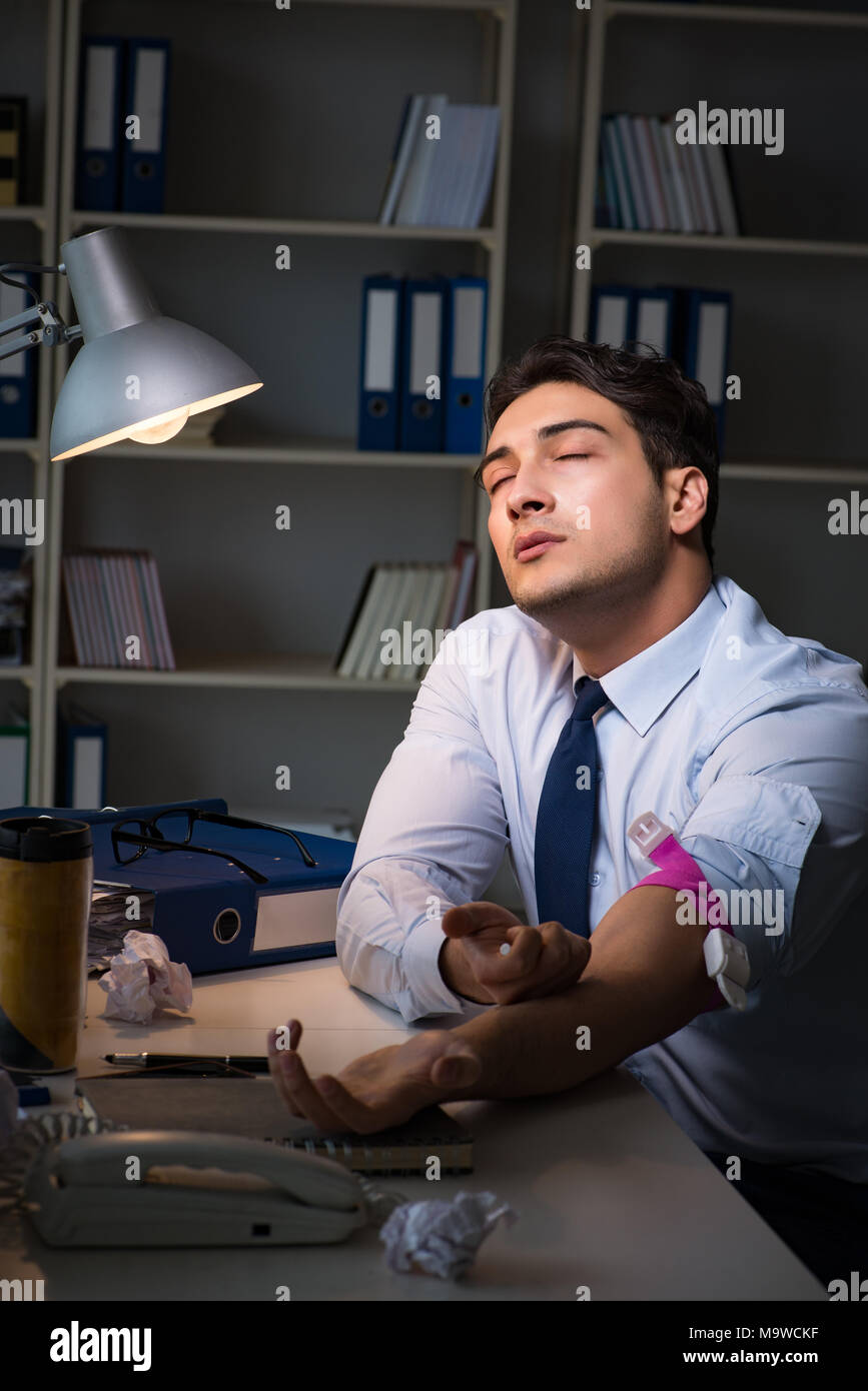 Employee relieving stress from overtime with drugs narcotics Stock ...