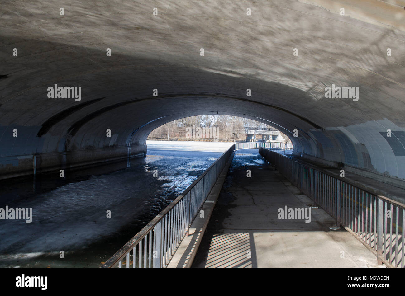 Late Winter Underpass with Walking Path Stock Photo - Alamy