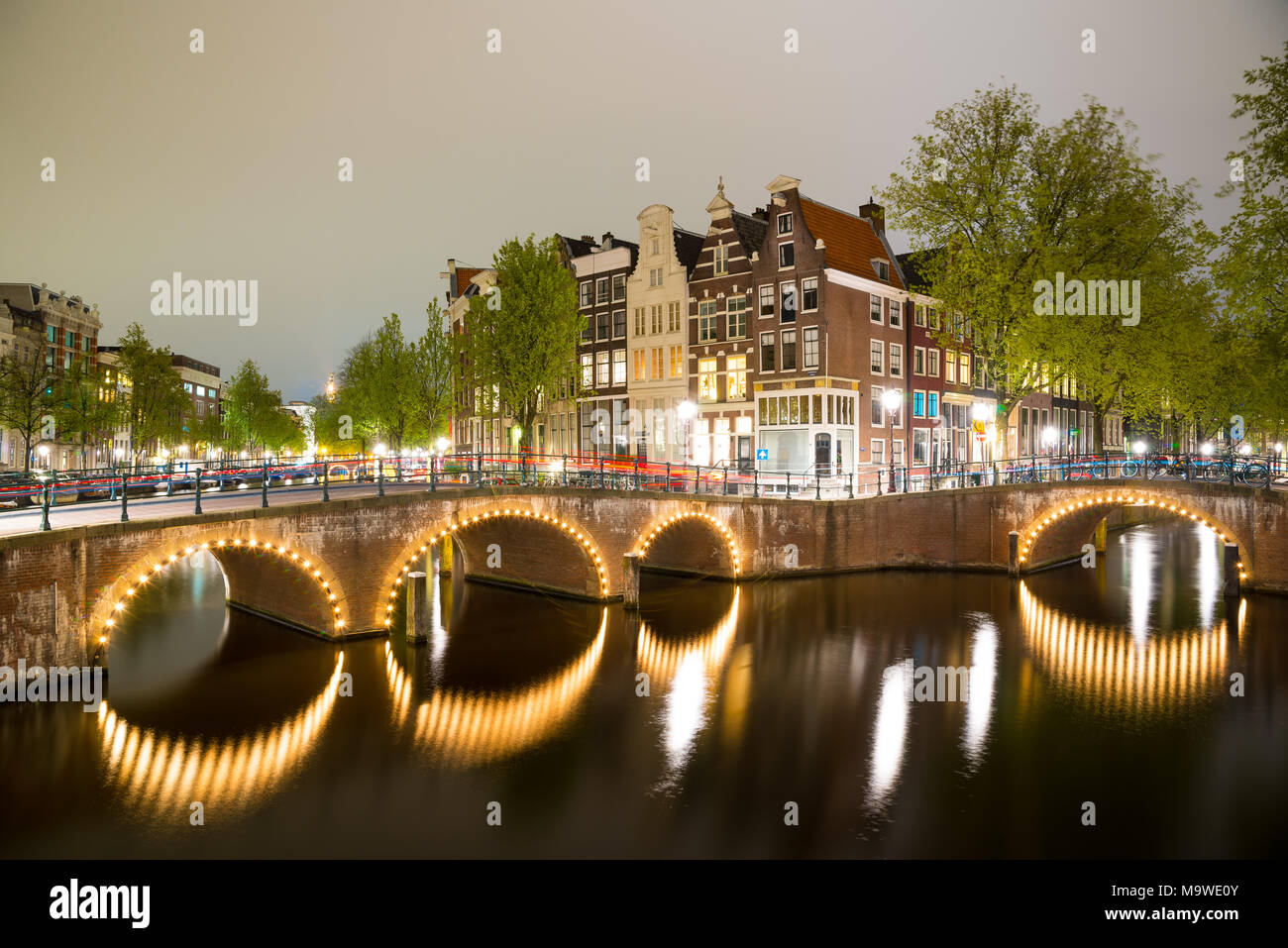Amsterdam, Netherlands - April 20, 2017: Picturesque canal in Amsterdam ...