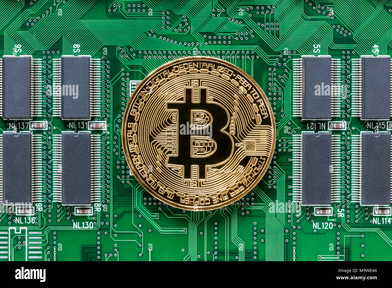 A photo of gold Bit coin on Printed Circuit Board, Bit coin and ...