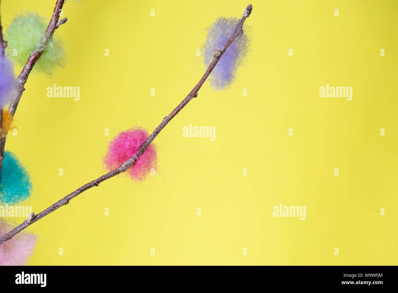 Easter bush over yellow background, traditional holiday usage Stock ...