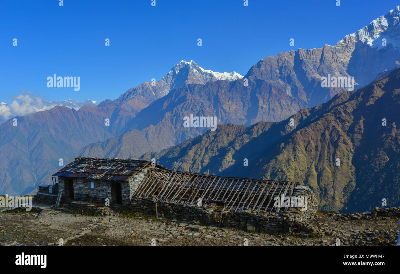 Mountain houses with snow peak of Annapurna Range in Khopra, Nepal ...