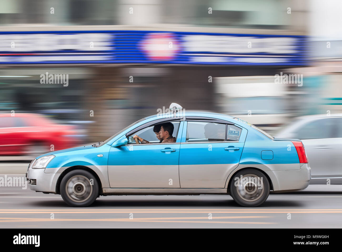 Chinese taxis hi-res stock photography and images - Alamy
