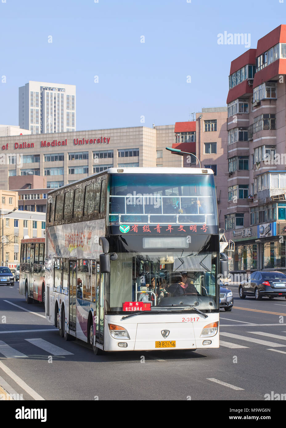 DALIAN-NOV. 27, 2012. Double-deck bus on the street. Several cities in ...