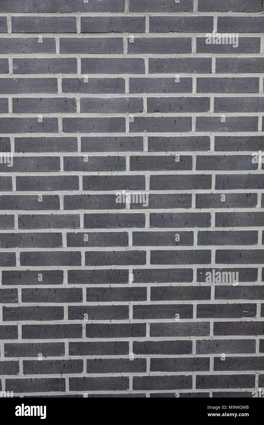 background consisting of part of anthracite brick wall Stock Photo - Alamy