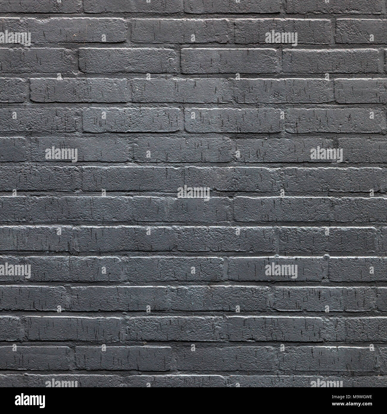 background consisting of part of anthracite brick wall Stock Photo - Alamy