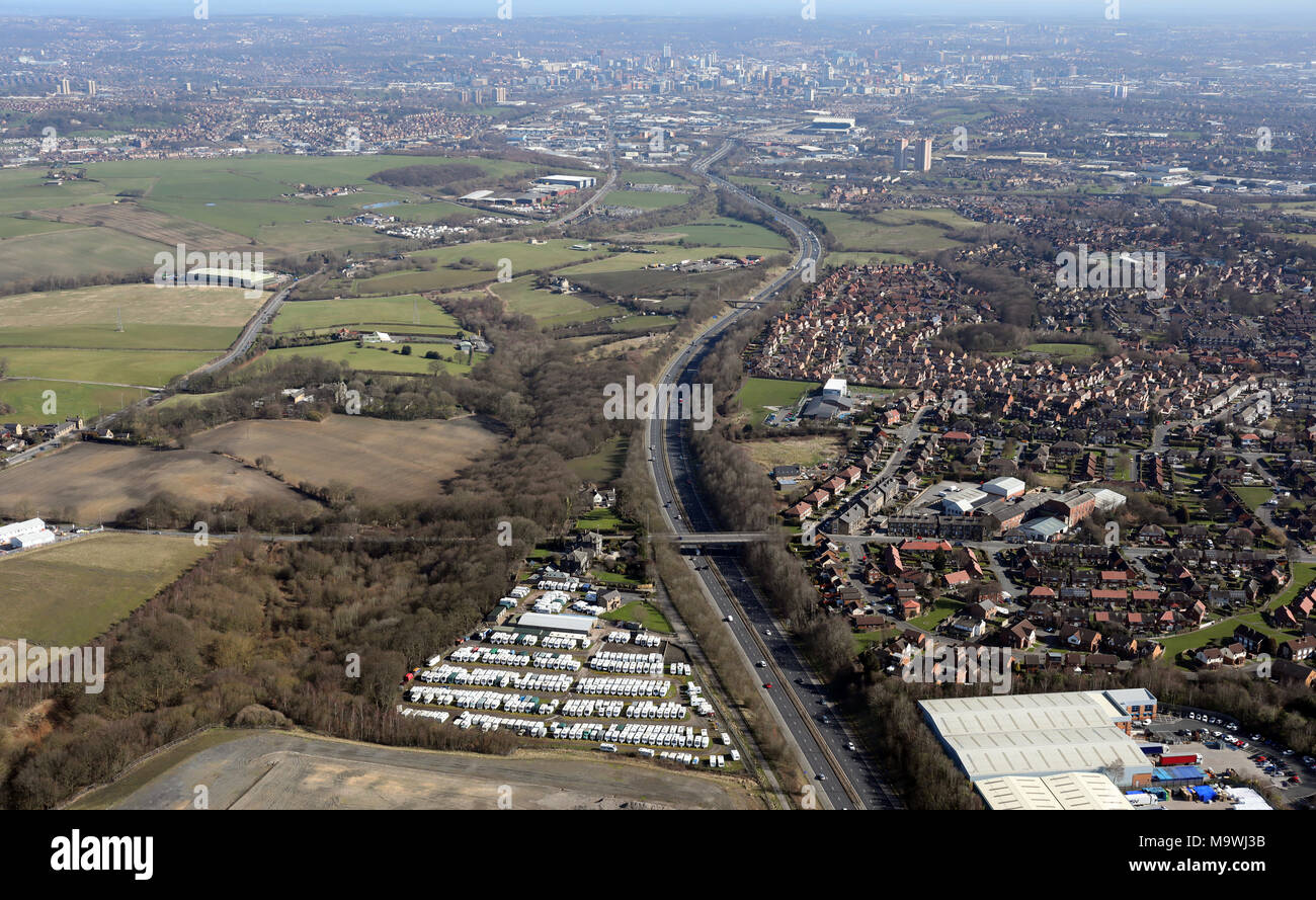 aerial view of the M621 heading north east into Leeds from junction 27 ...