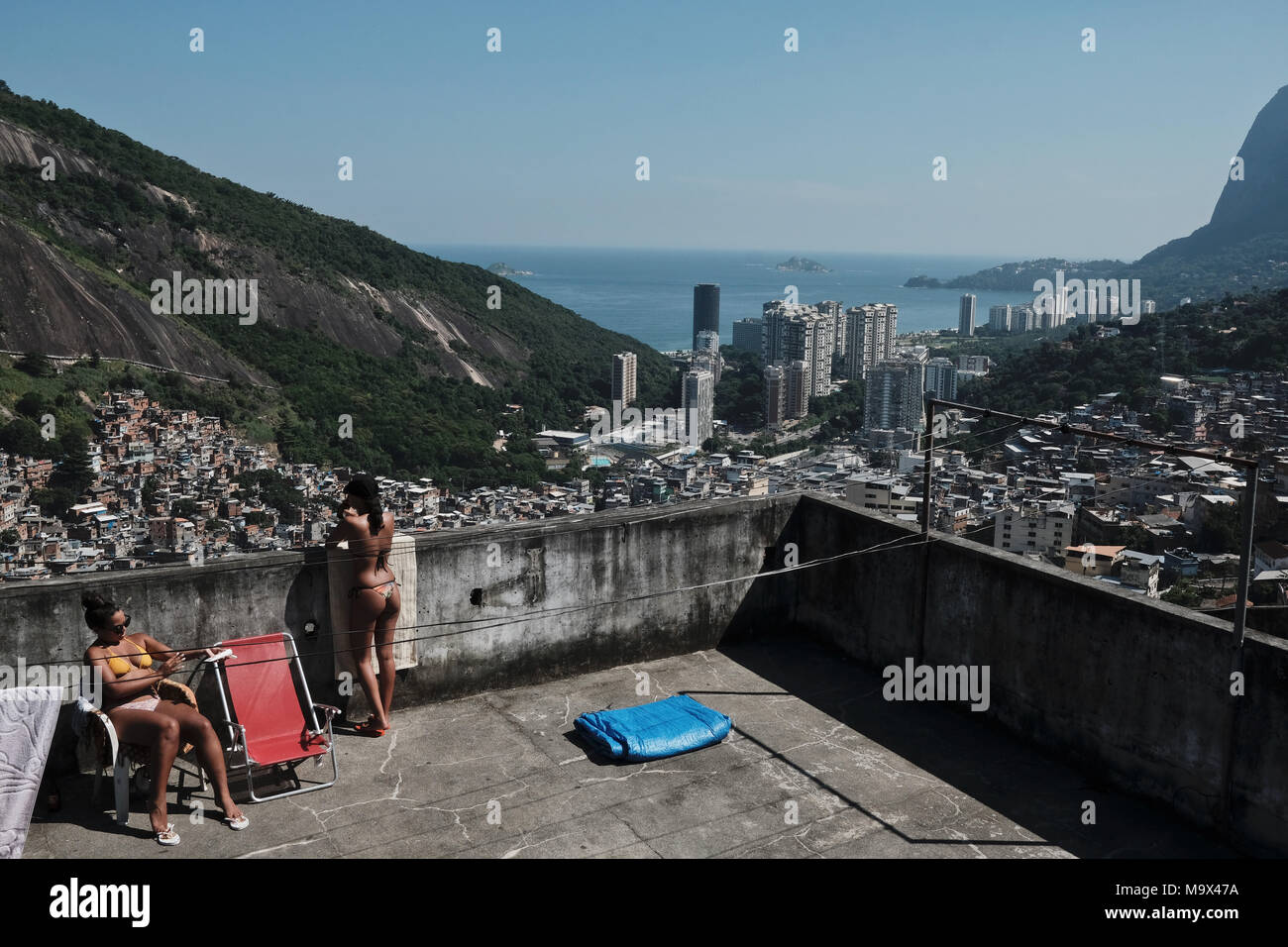 27 March 2018, Brazil, Rio de Janeiro: Two women sunbathing on a ...