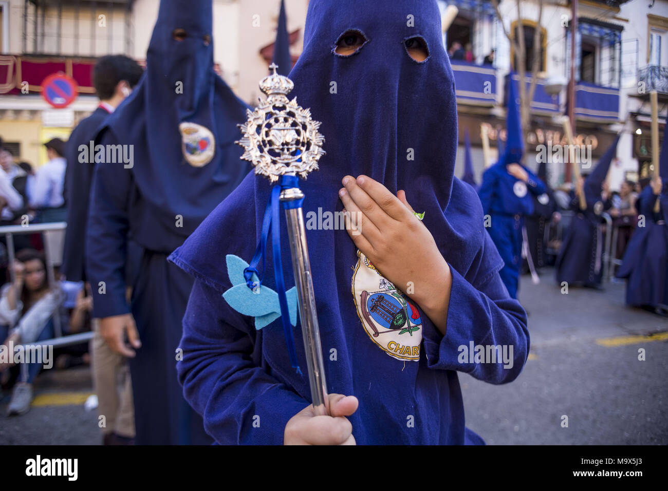 Seville, Spain. 28th Mar, 2018. A penitent of Brotherhood called ''El ...