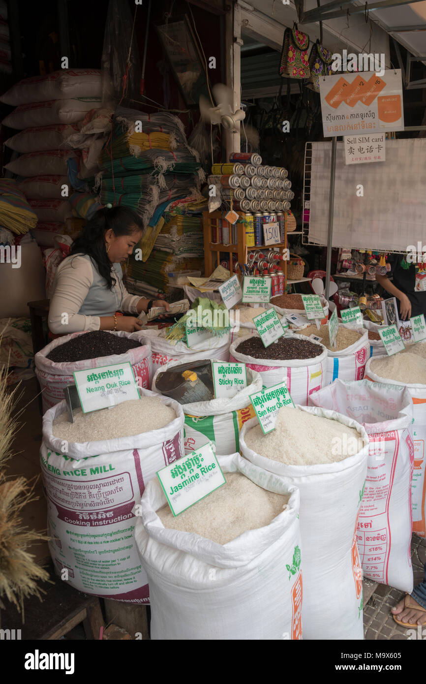 Siem Reap, Cambodia, 28 March 2018. Woman cambodian selling different ...