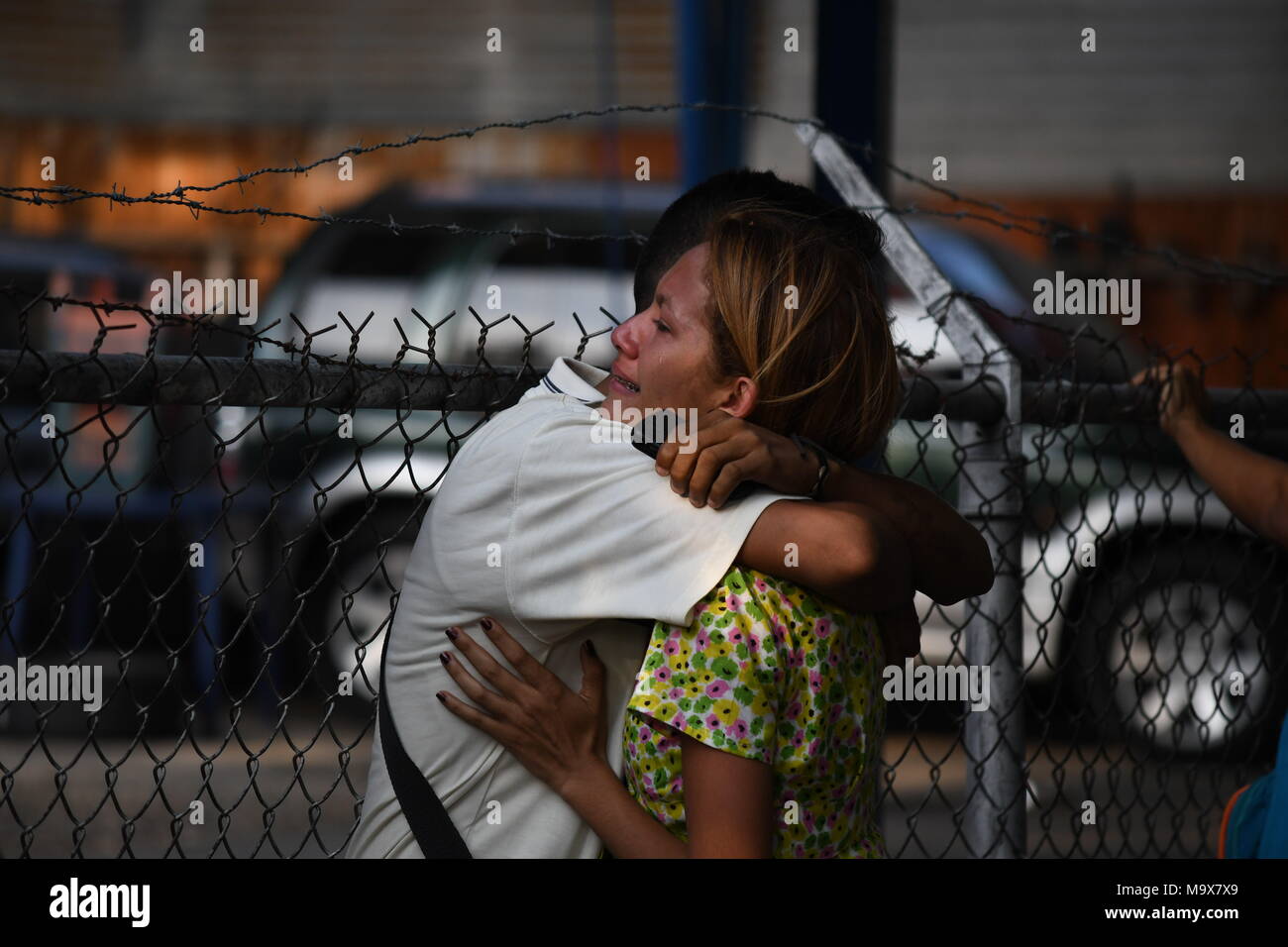 Police hugging hi-res stock photography and images - Alamy