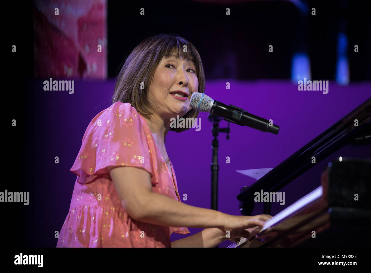 Akiko Yano performs at the piano at the Cherry Blossom Festival Opening ...