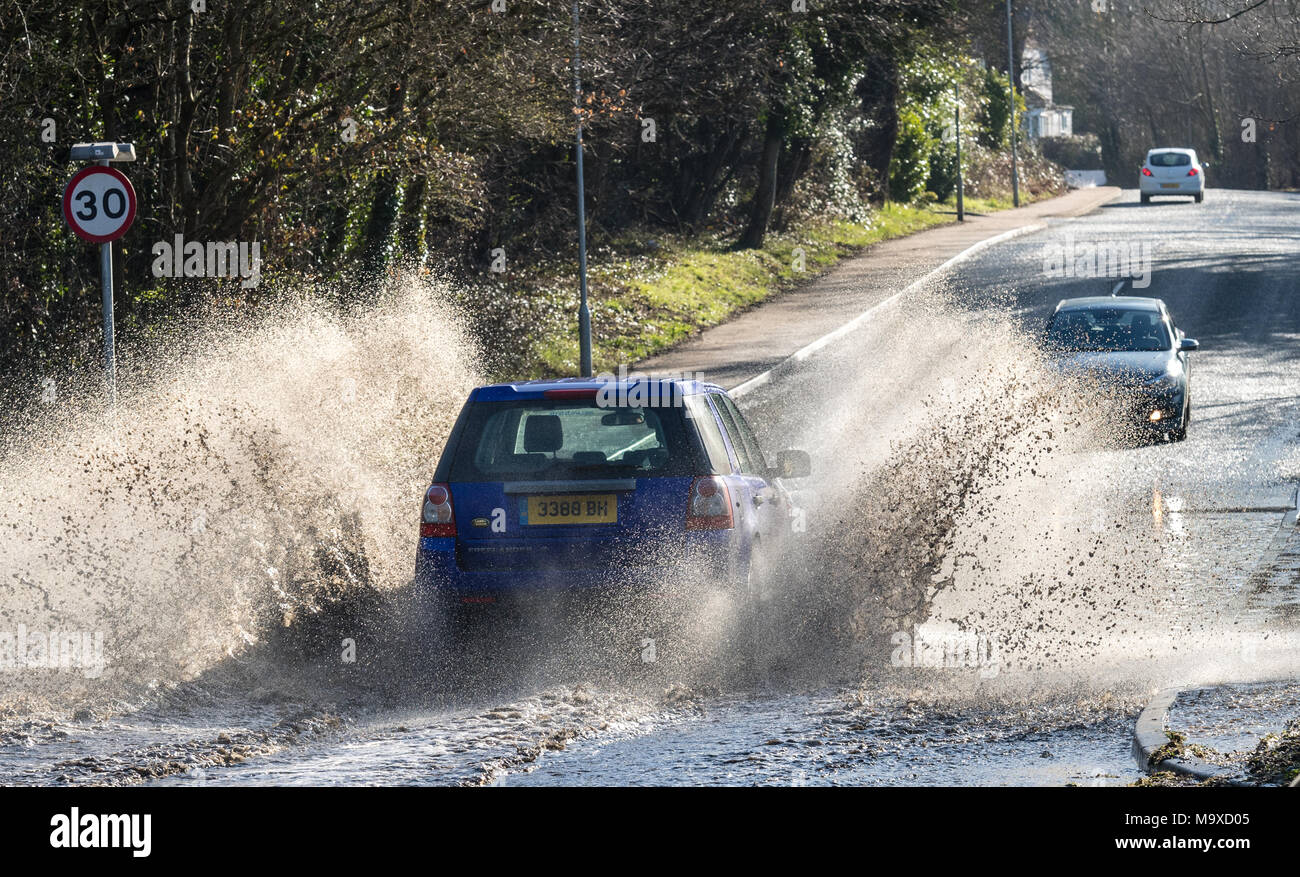 Cars pass in flooding hi-res stock photography and images - Alamy