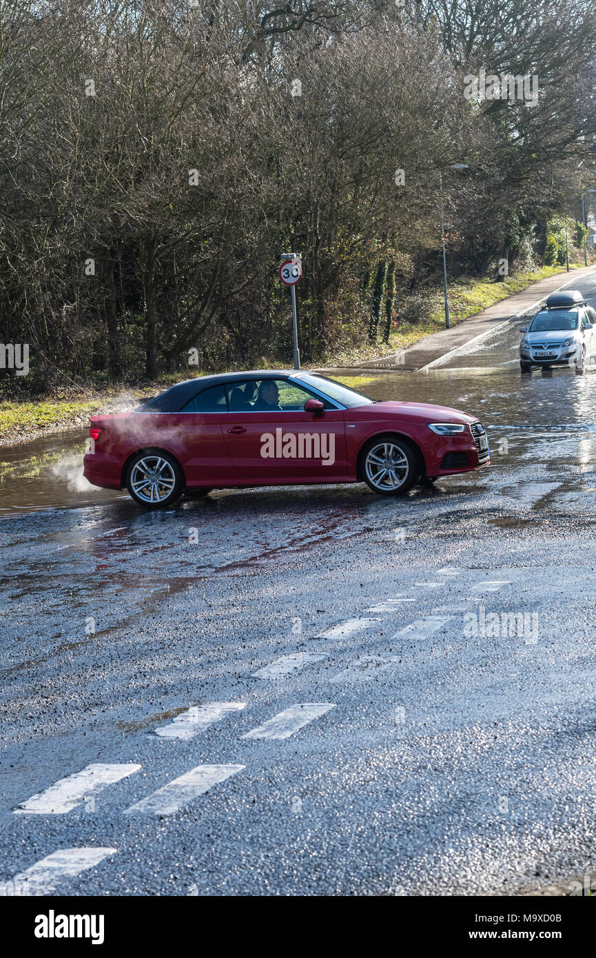 Car avoids flooded road hi-res stock photography and images - Alamy
