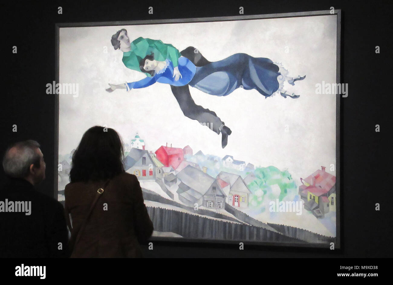 26 March 2018, Frace, Paris: A visitor looking at the piece "Over the ...