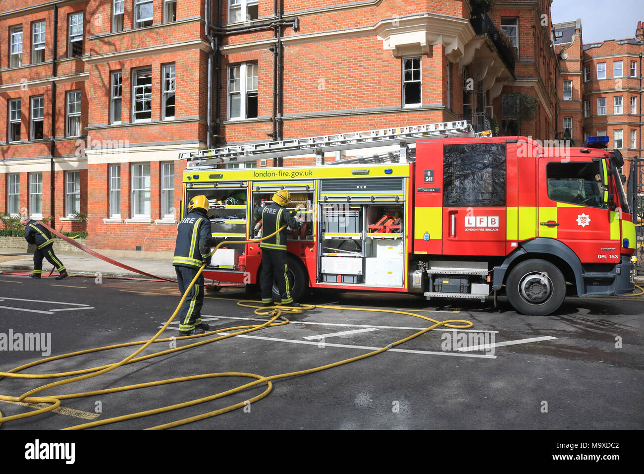 Emergency services attend the scene of a fire hi-res stock photography ...