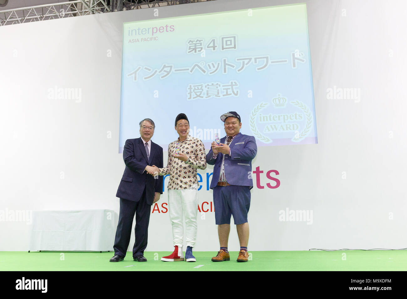 Japanese comedians Miyazon (C) and Arapon (R) of ANZEN manzai comic duo ...