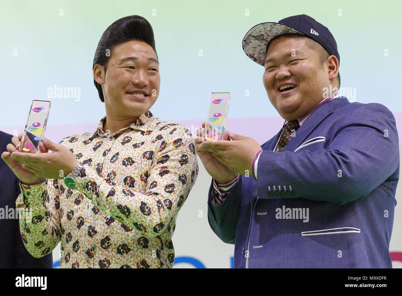 Japanese comedians Miyazon (C) and Arapon (R) of ANZEN manzai comic duo ...