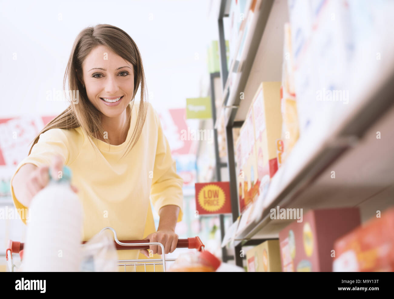 Putting milk in grocery cart hi-res stock photography and images - Alamy