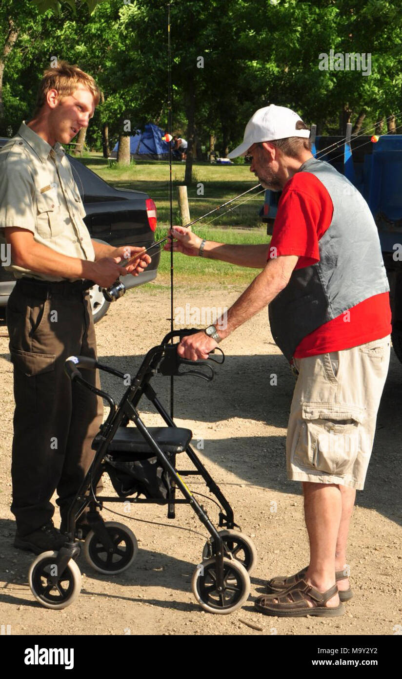 STEP Kyle Slifka gets a pole for Project COMPASS participant. STEP Kyle ...