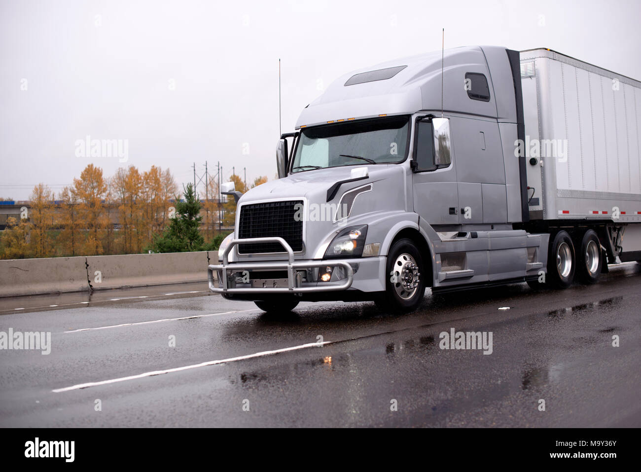 Silver comfort professional driving big rig semi truck long distance ...