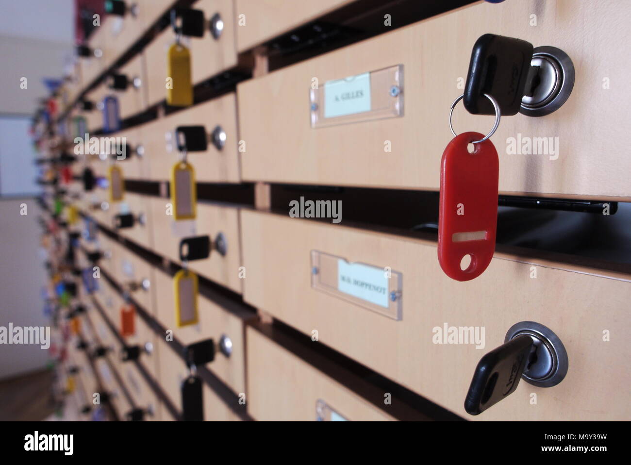 Keys on lockers doors, Lyon, France Stock Photo - Alamy