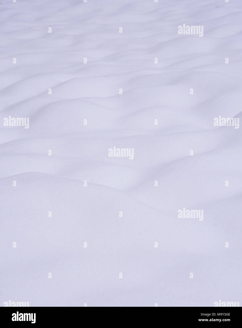 Wind sculpted snow Stock Photo - Alamy