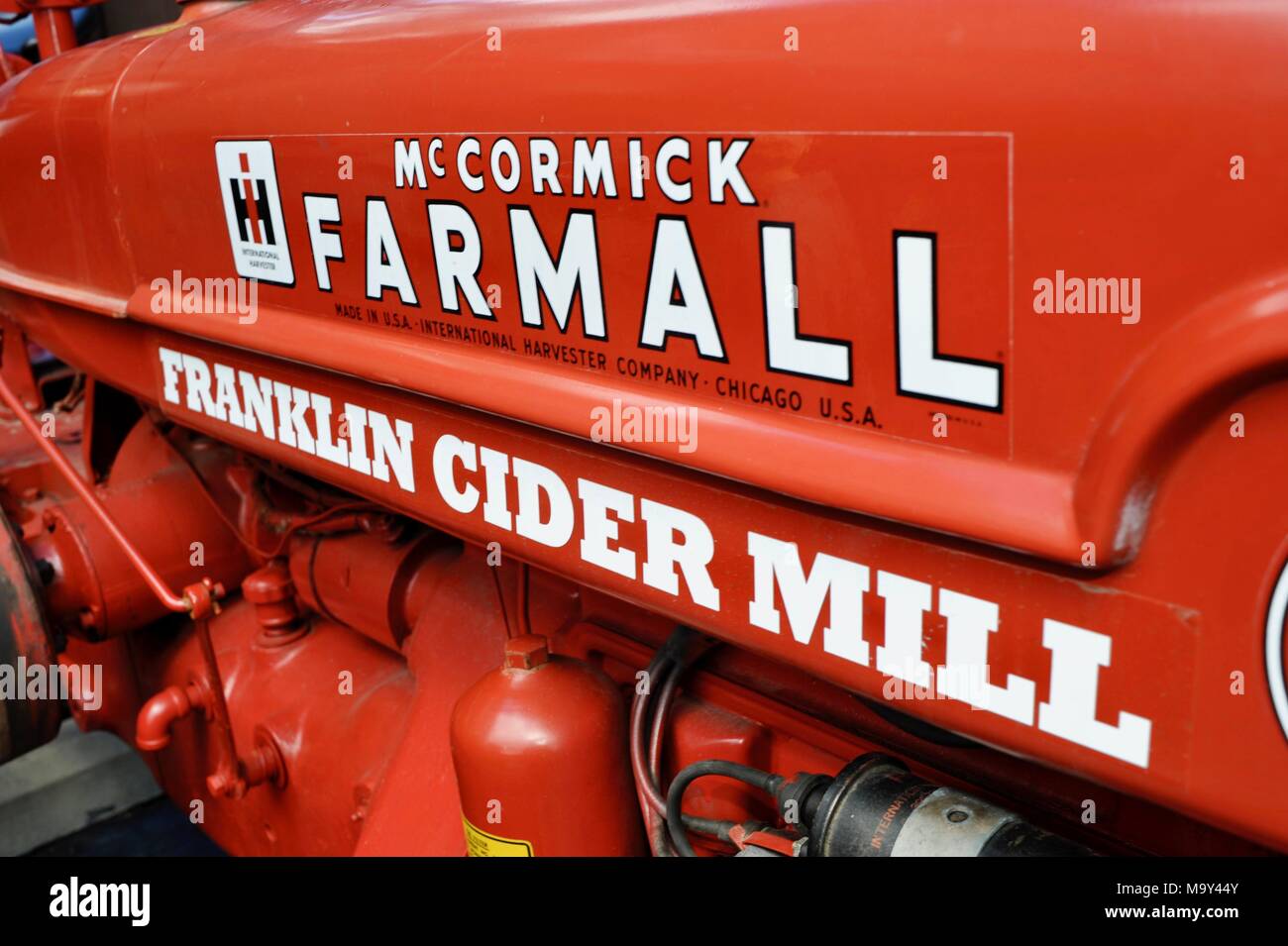 Red McCormick Farmall tractor with name written on side for historic ...