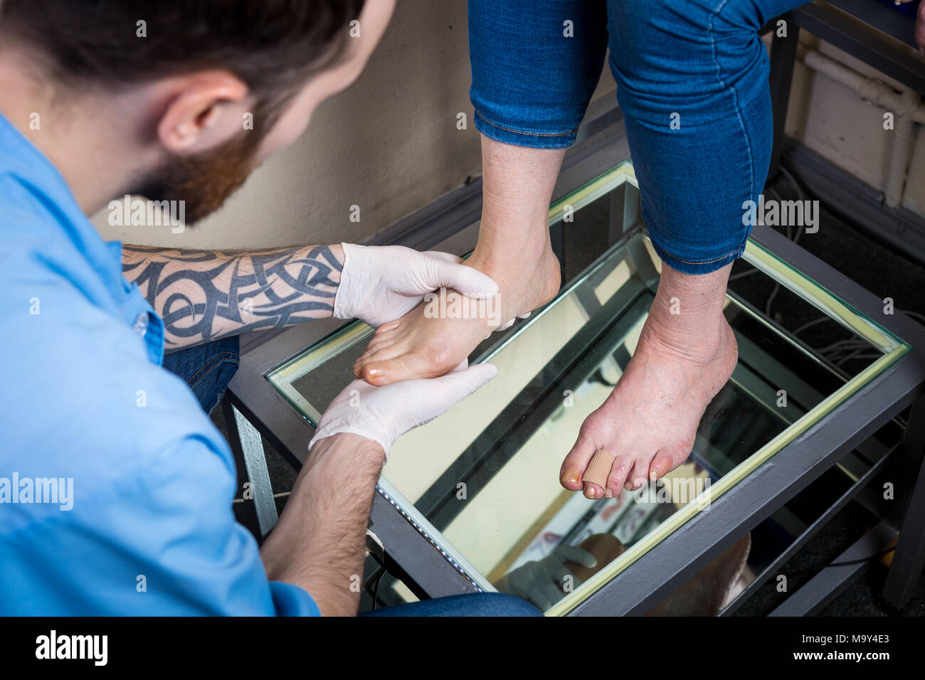 Woman measure man leg hi-res stock photography and images - Alamy