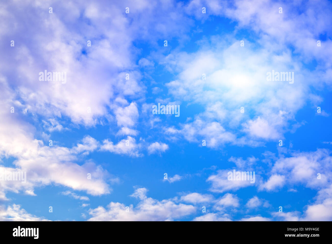 shining bright sky with clouds and glare from the sun's rays Stock ...