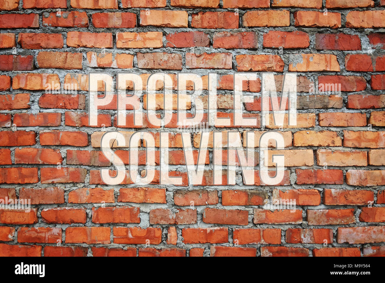 Problem solving, business concept words, with red brick tiled walls as ...