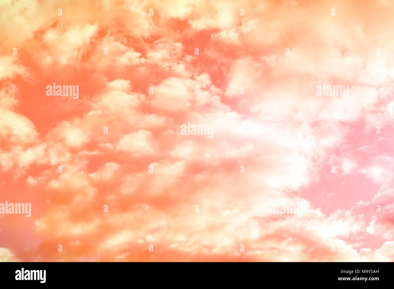 texture bright contrast sky with clouds and sun rays Stock Photo - Alamy