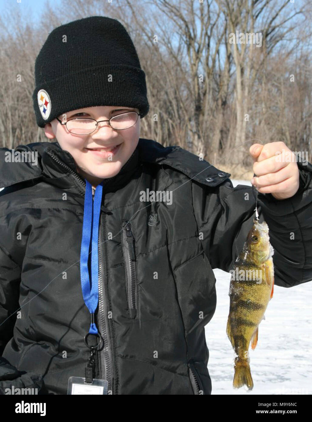 boy with perch Stock Photo - Alamy