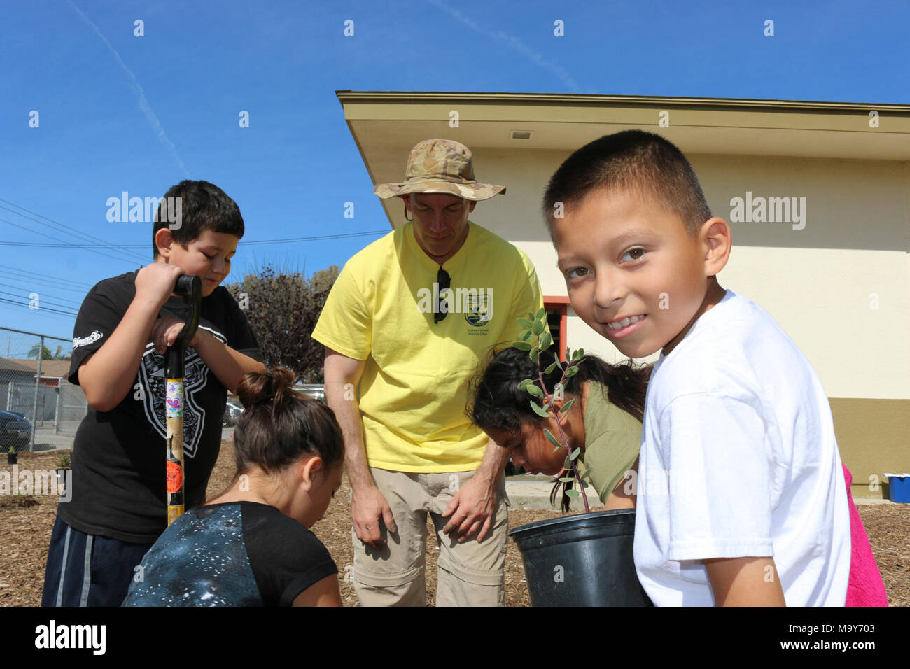 Building a habitat for pollinators. Fish and wildlife biologist Mark ...