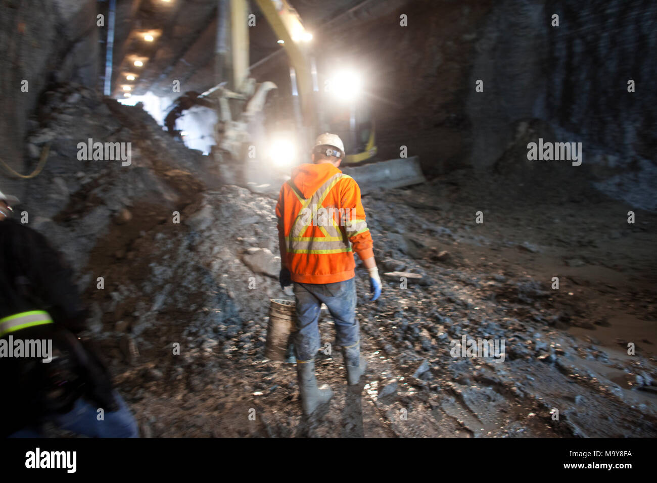 Employees of Technicore Underground construct an under-lake pedestrian ...