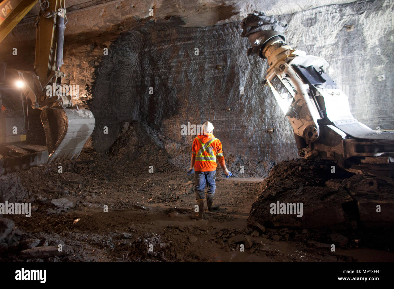 Employees of Technicore Underground construct an under-lake pedestrian ...
