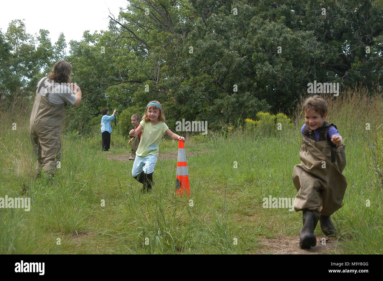 Kids crossing finish line hi-res stock photography and images - Alamy
