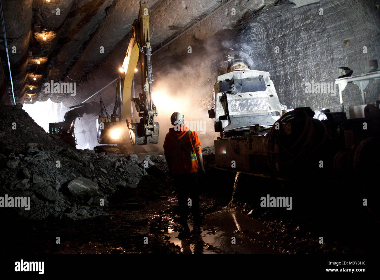 Employees of Technicore Underground construct an under-lake pedestrian tunnel connecting the ...