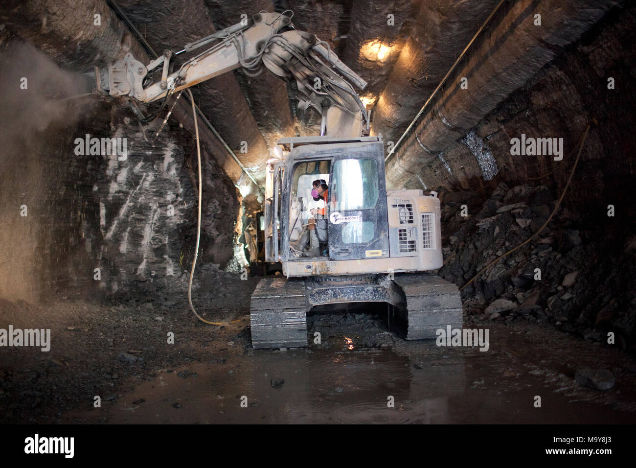Employees of Technicore Underground construct an under-lake pedestrian ...