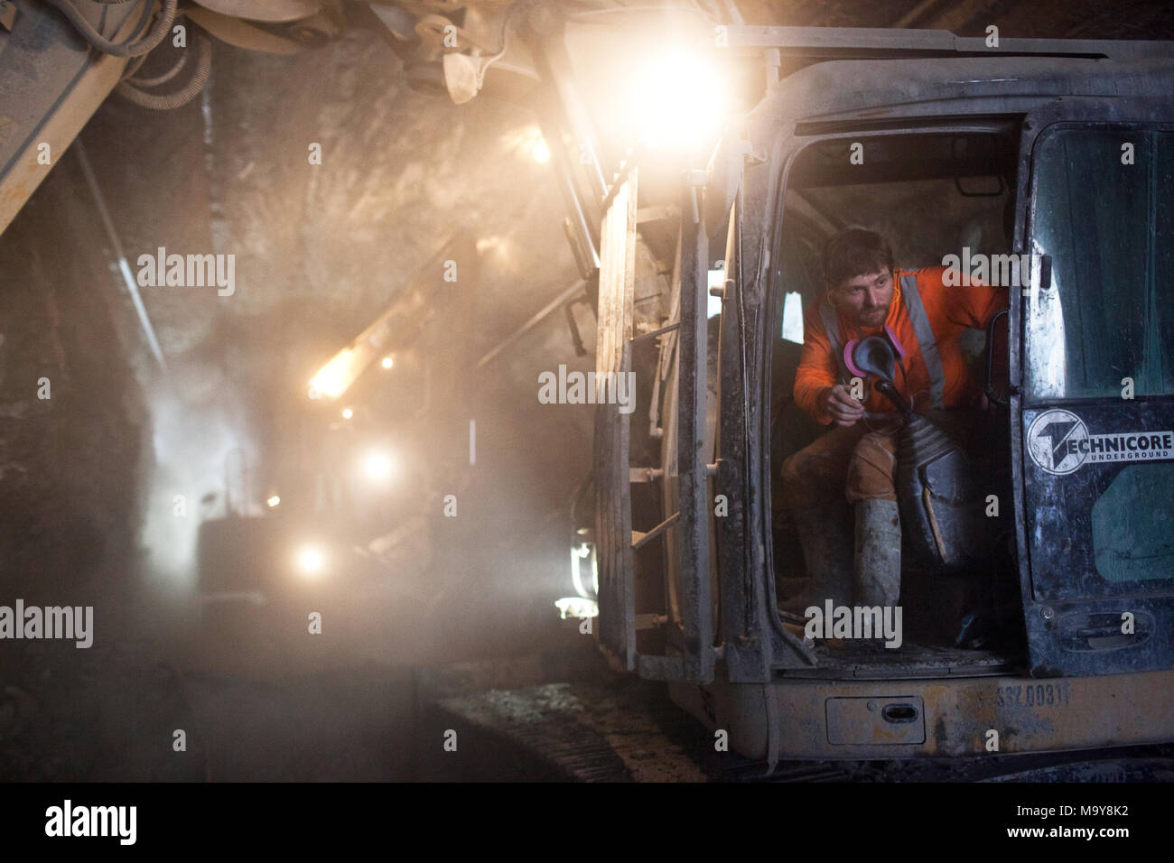 Employees of Technicore Underground construct an under-lake pedestrian ...