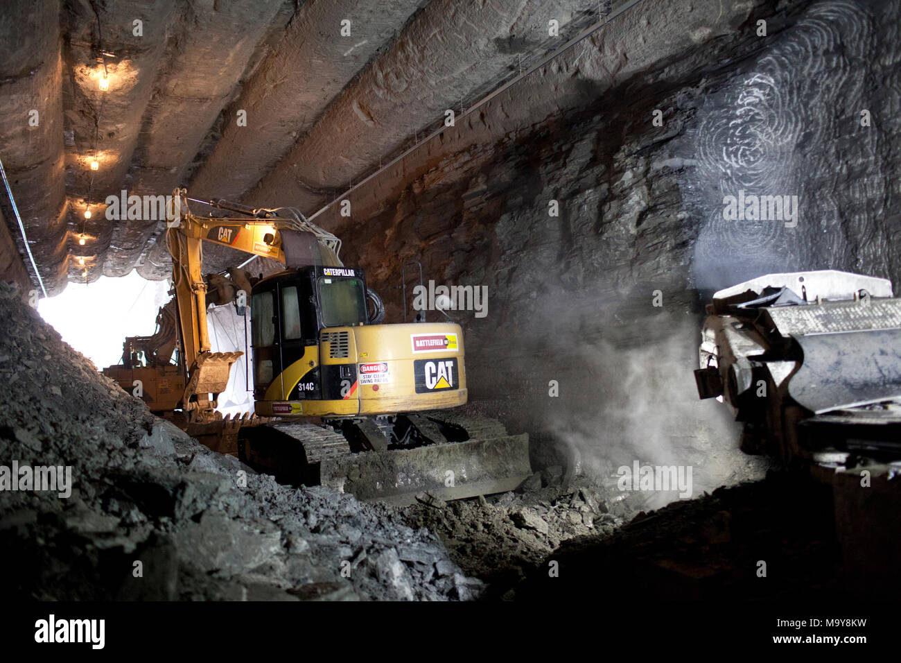 Employees of Technicore Underground construct an under-lake pedestrian ...