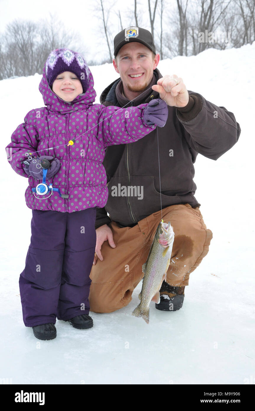 Kids ice fishing competition Stock Photo - Alamy