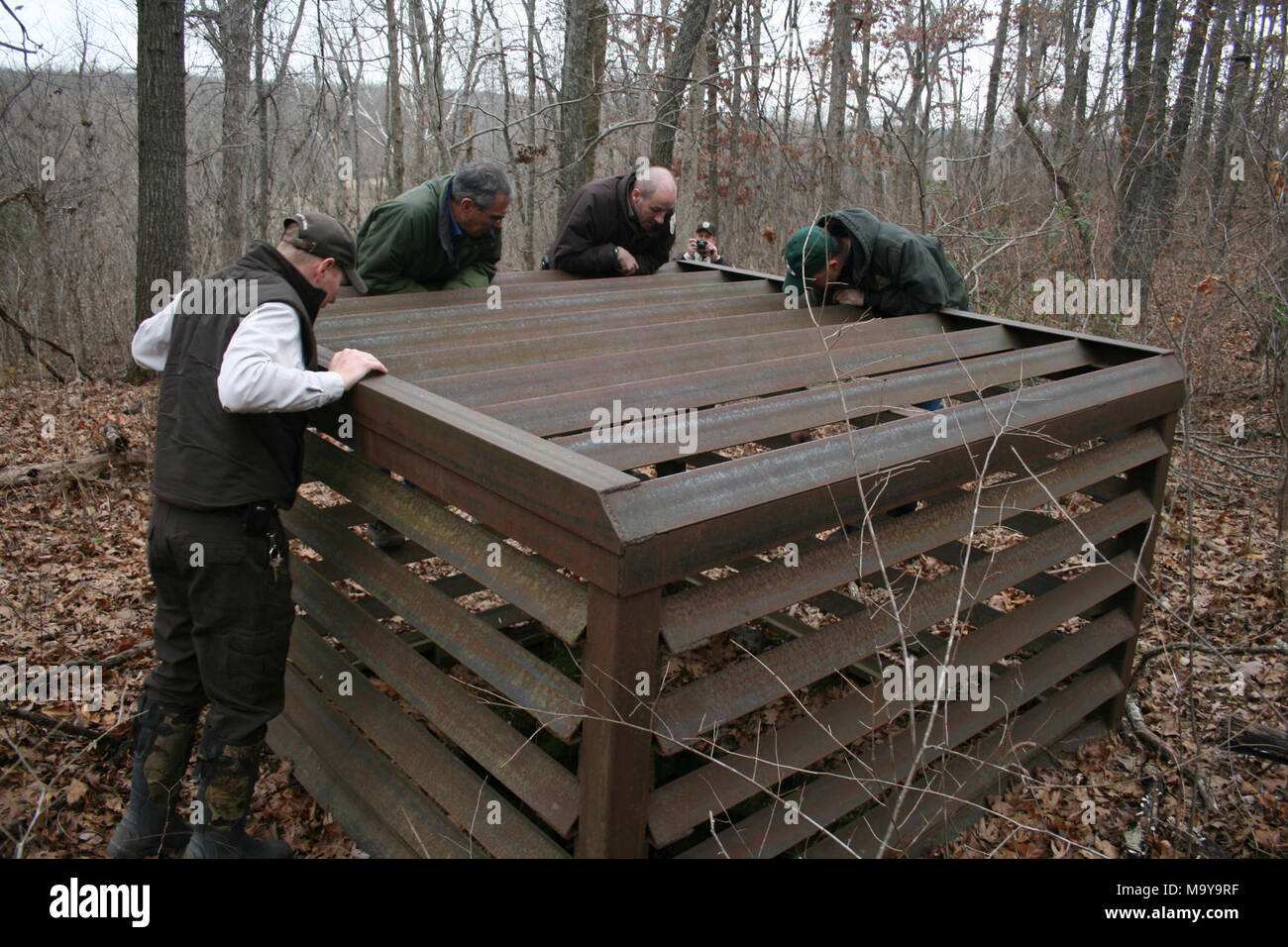 Group Inspecting Fence Protecting on Paris Springs Conservation Area ...