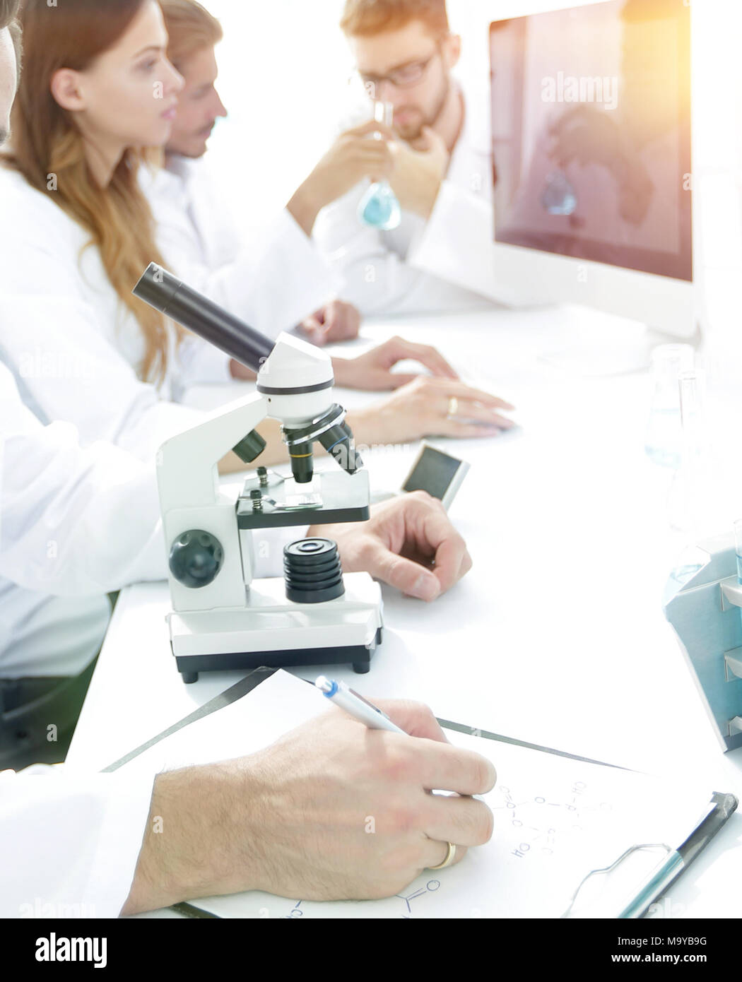 serious scientists working in the laboratory Stock Photo - Alamy