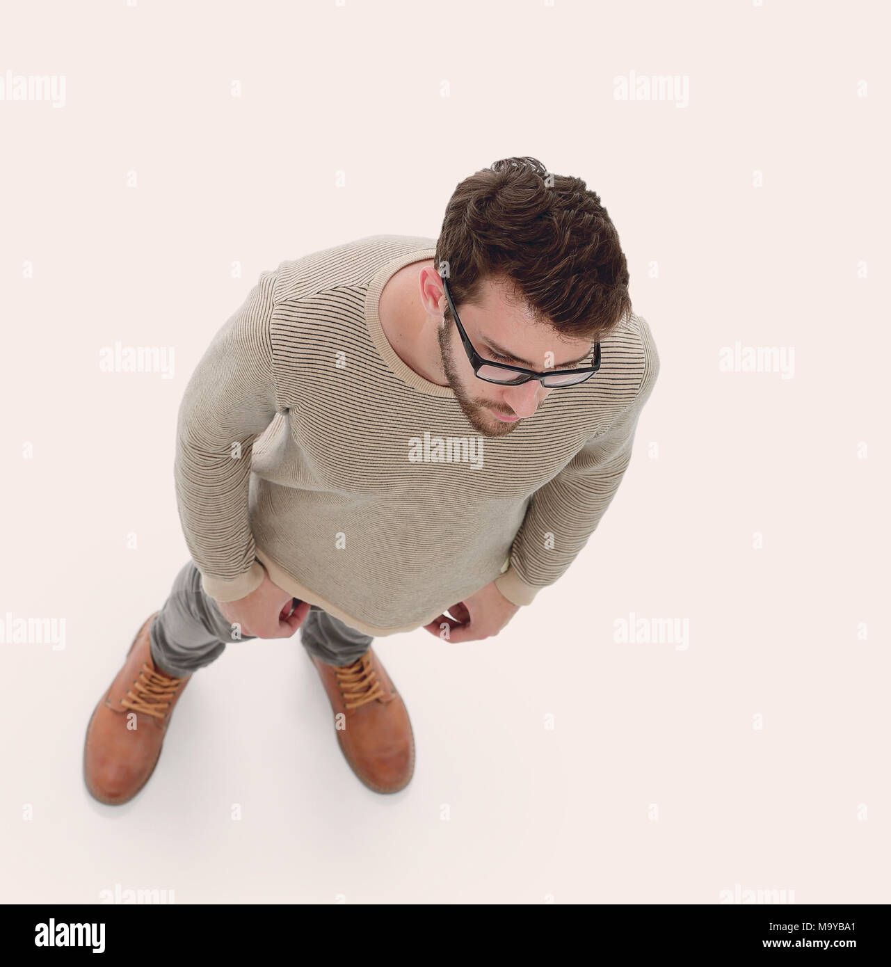 view from above. serious young man looking forward Stock Photo - Alamy