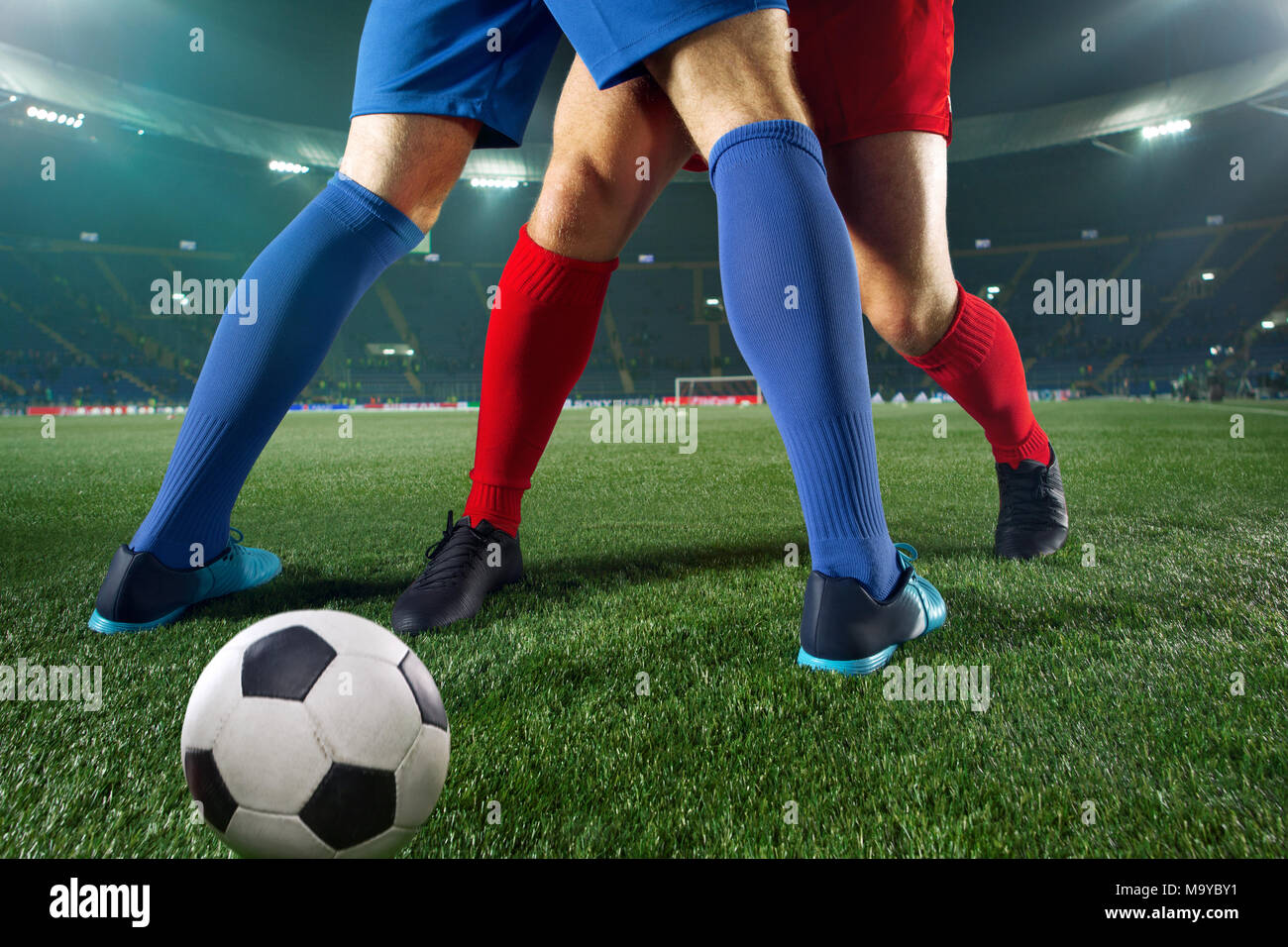 Two football players fight hi-res stock photography and images - Alamy