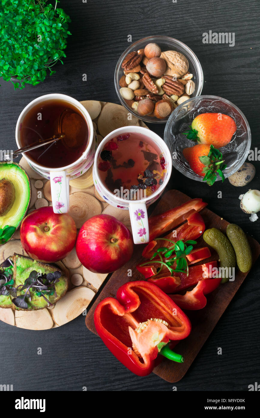 quail eggs and fresh vegetables, cheese, nuts, avokado, sandwich with ...