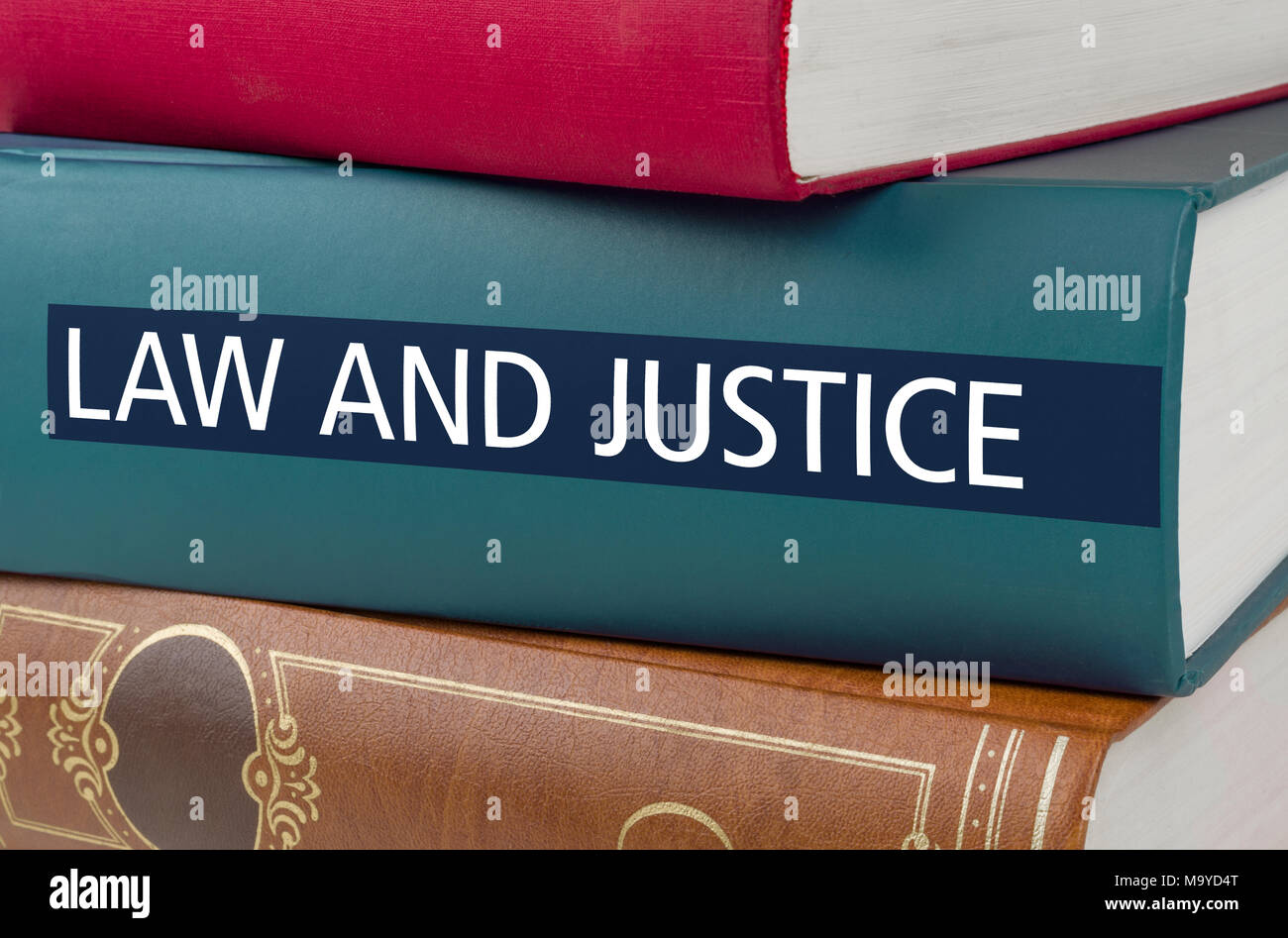 A book with the title Law and Justice written on the spine Stock Photo ...