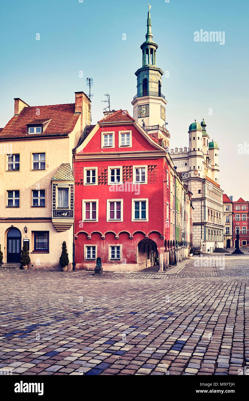 Market Square in the Poznan Old Town at sunrise, retro toned picture ...